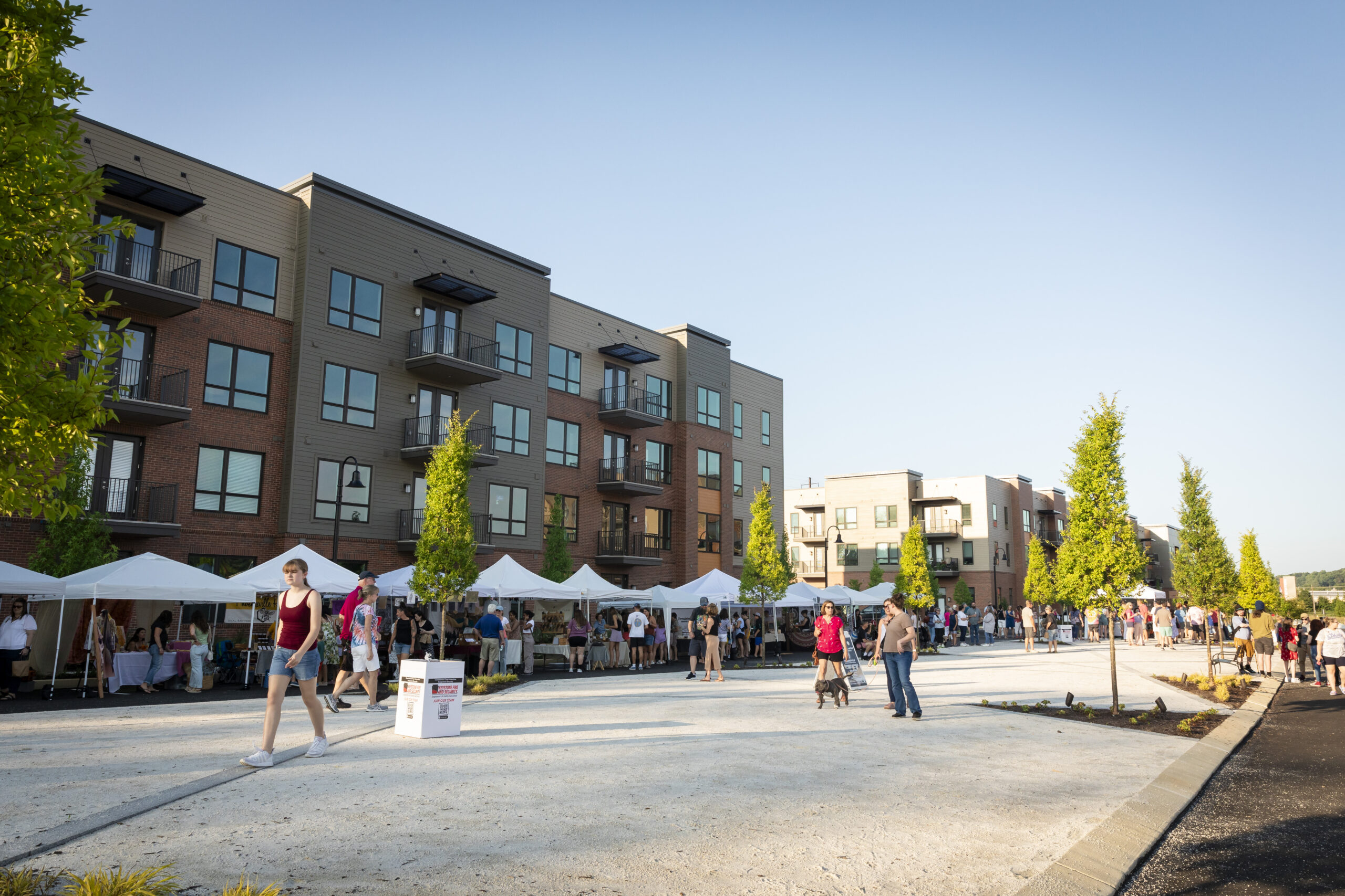 Hankin Group Welcomes Community to New River Station Apartments at Craft & Mercantile Market ...